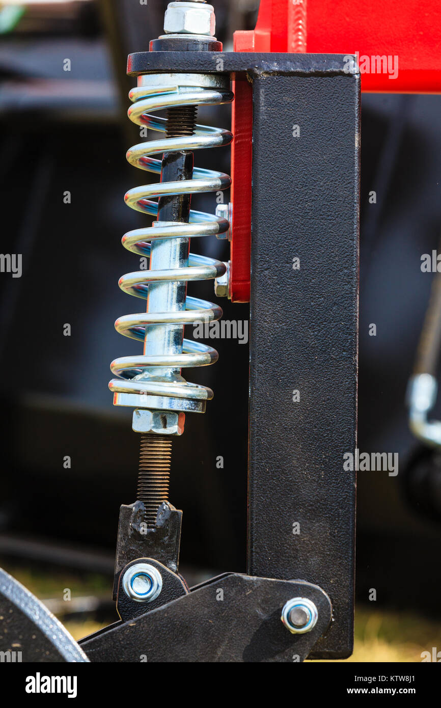 Pump, device, detail closeup concept. Big, hard made of steel spring on ...