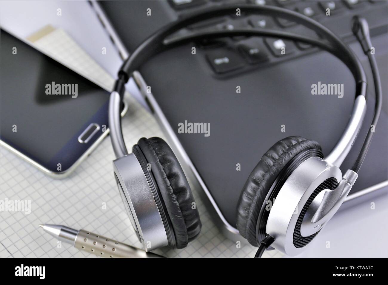 An concept Image of a Office desk with a Headset and a Keyboard Stock ...