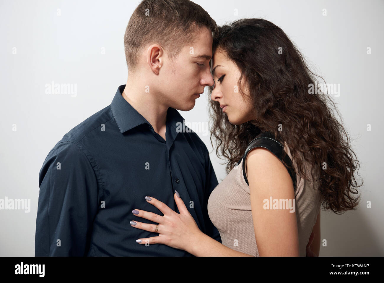 couple portrait on white background Stock Photo - Alamy