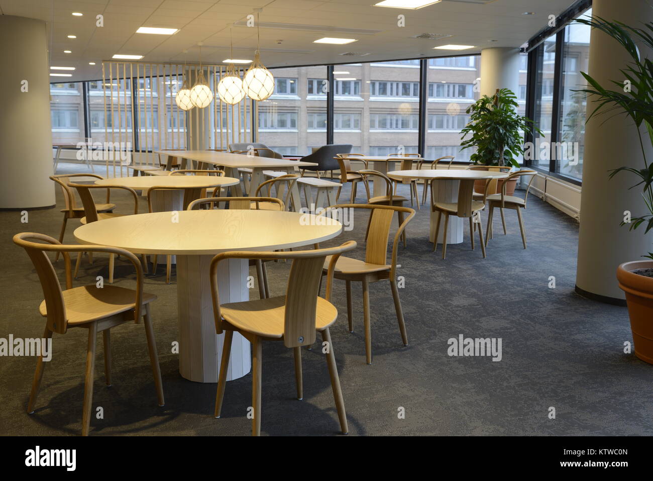 An empty cafeteria interior shot. Large windows letting in light Stock ...