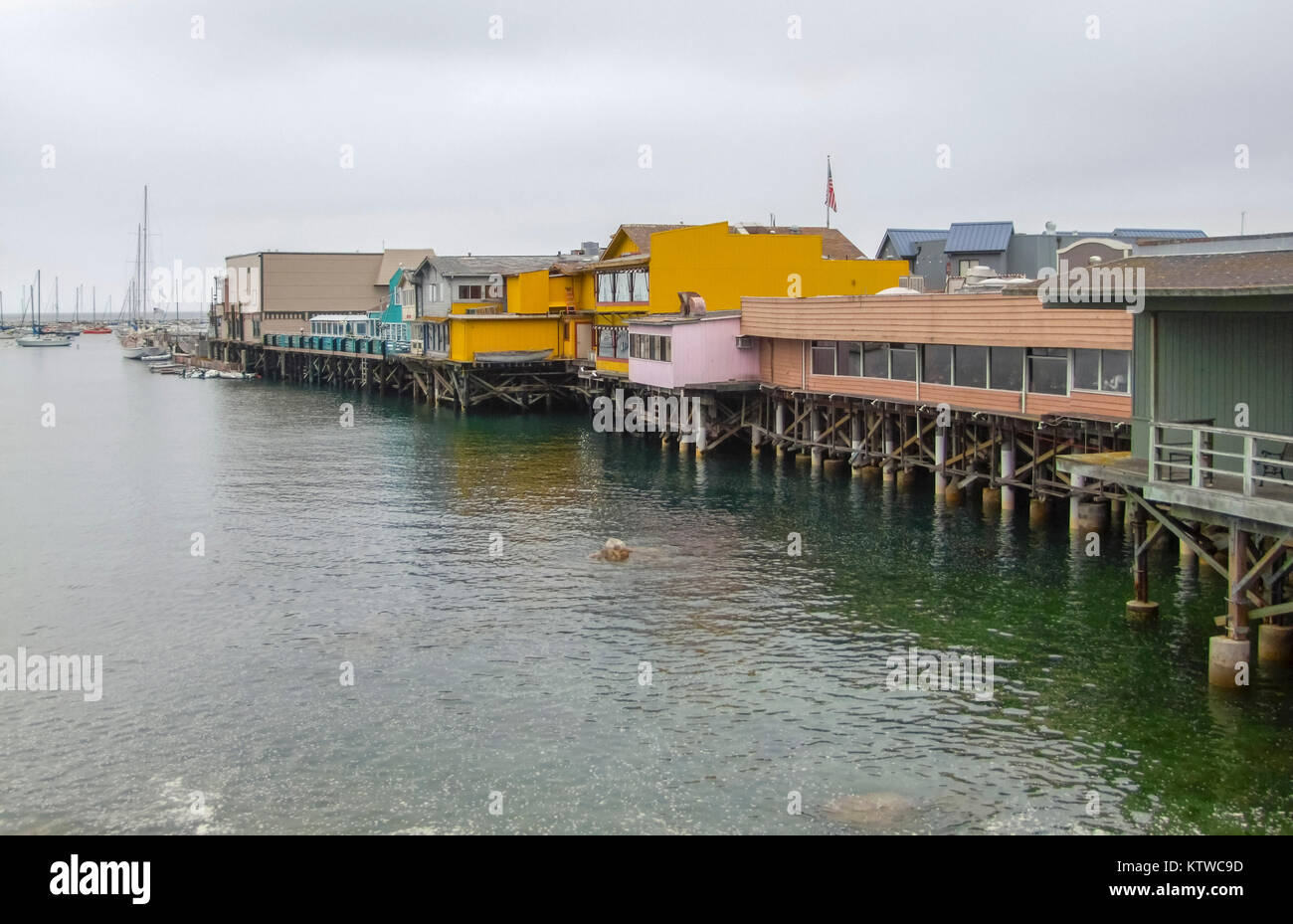 coastal pier scenery seen in USA in clouded ambiance Stock Photo - Alamy