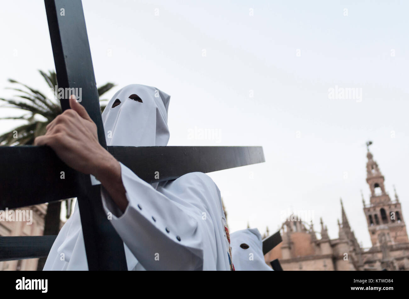 Color photography of a penitent of the holly week of Seville, Spain ...