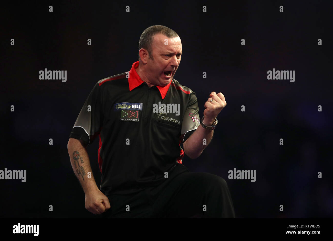 Darren Webster celebrates winning the first set during day eleven of ...