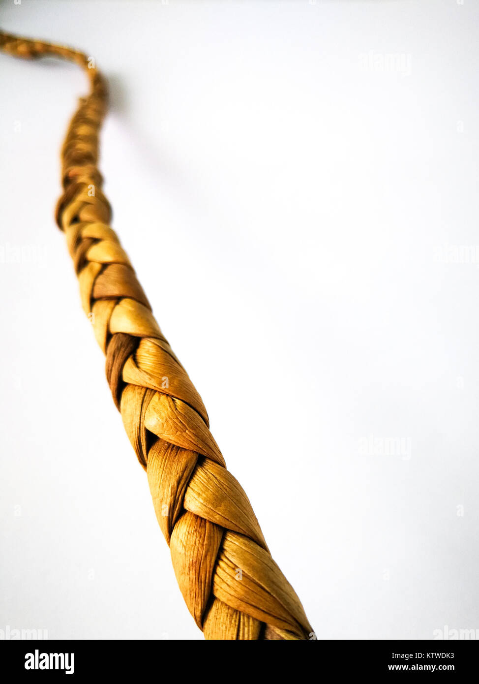 thick jute rope on white isolated background Stock Photo - Alamy