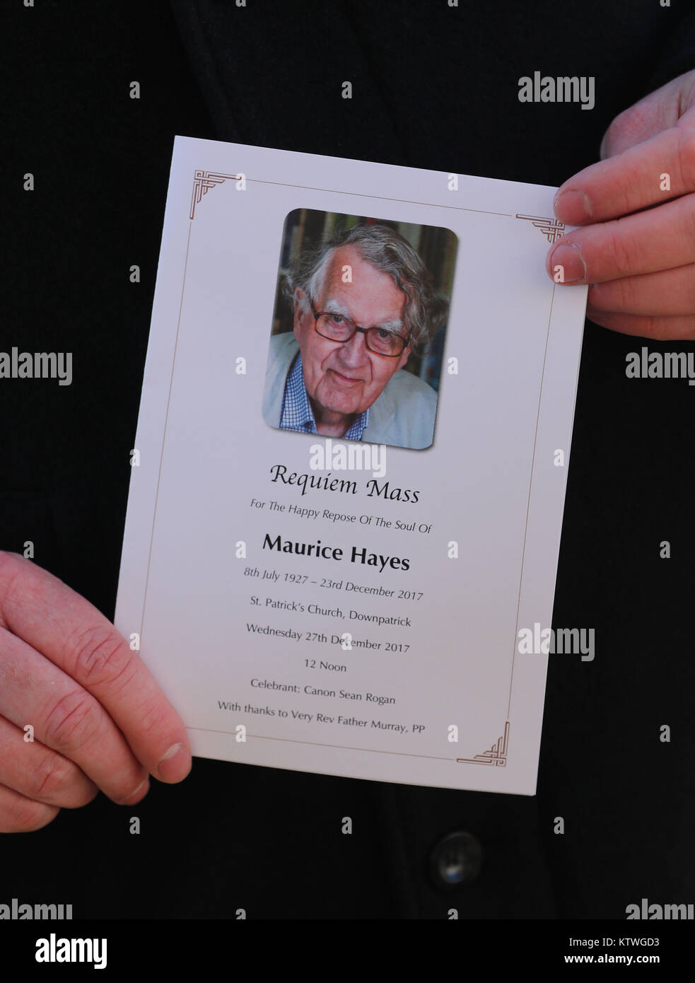 An order of service is seen during the funeral of Dr Maurice Hayes at ...