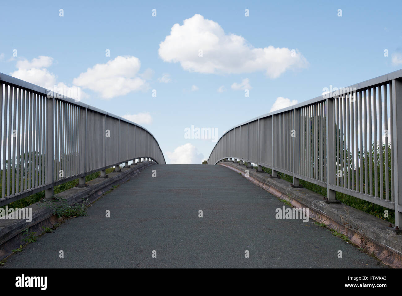 Footpath on a bridge with railings Stock Photo - Alamy