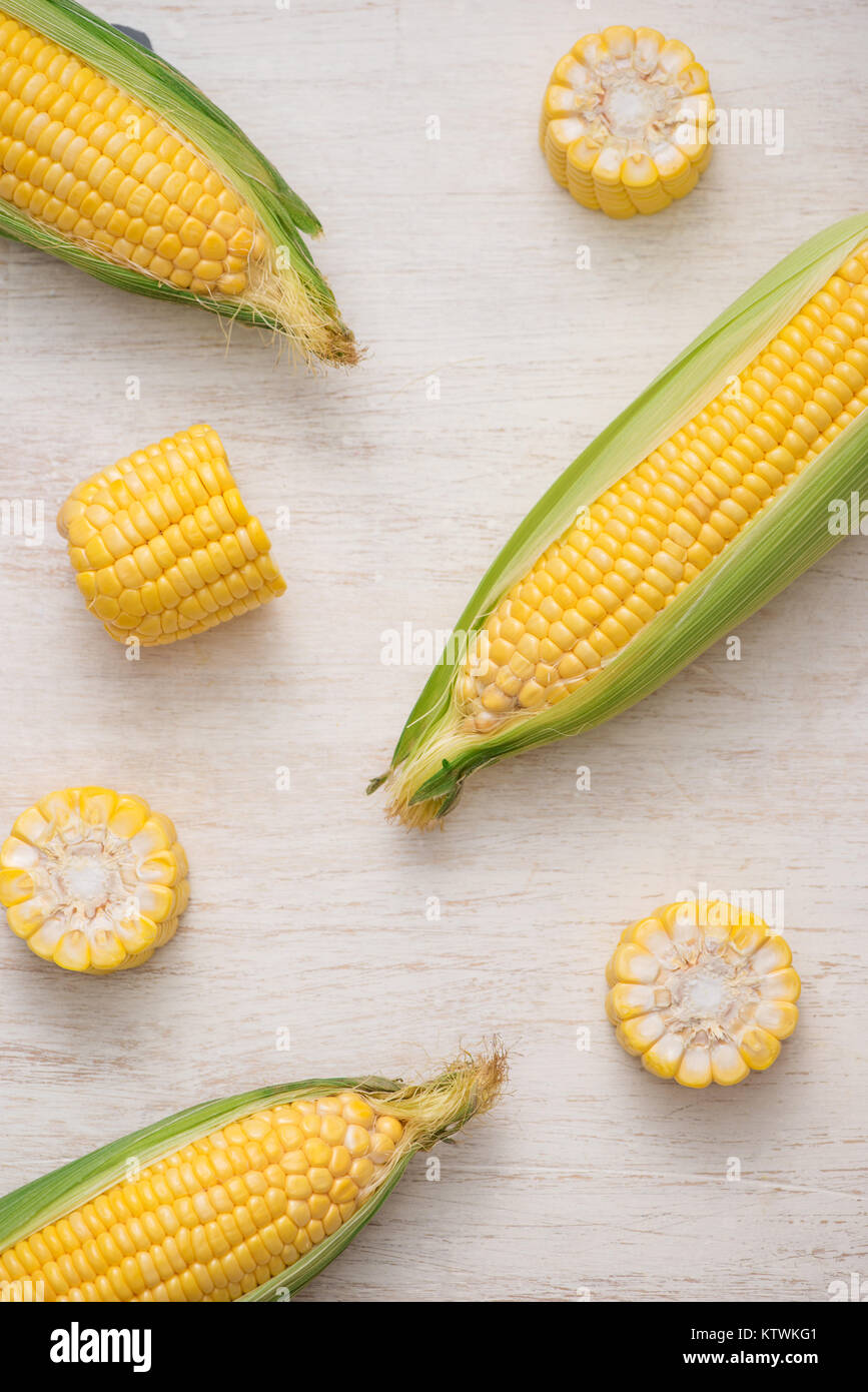 Sweet corns. Fresh corn on cobs on wooden table Stock Photo - Alamy