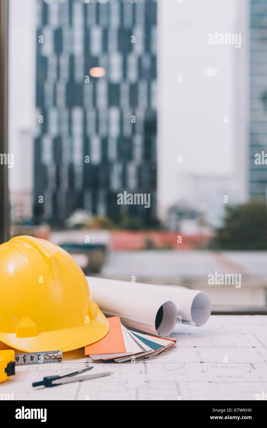 Vintage business desk of engineer contractor with equipment, blueprint ...