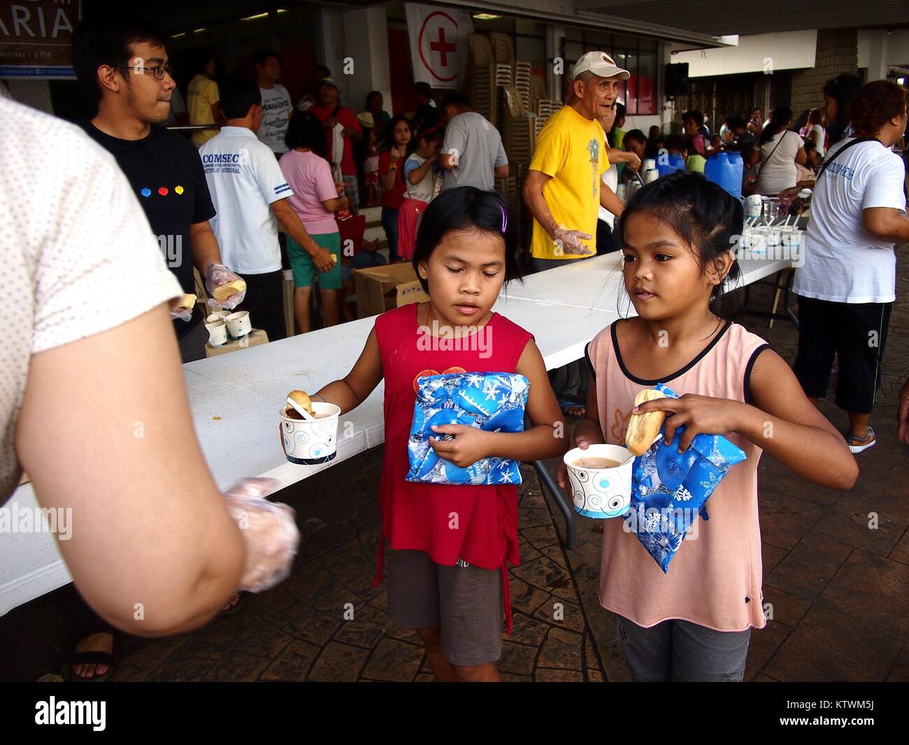 Philippines feeding program hi-res stock photography and images - Alamy
