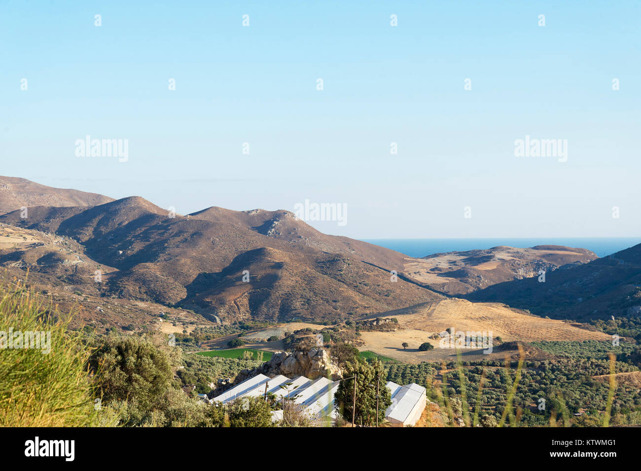 Hills with bushes on a Sunny day on the island of Crete Stock Photo - Alamy