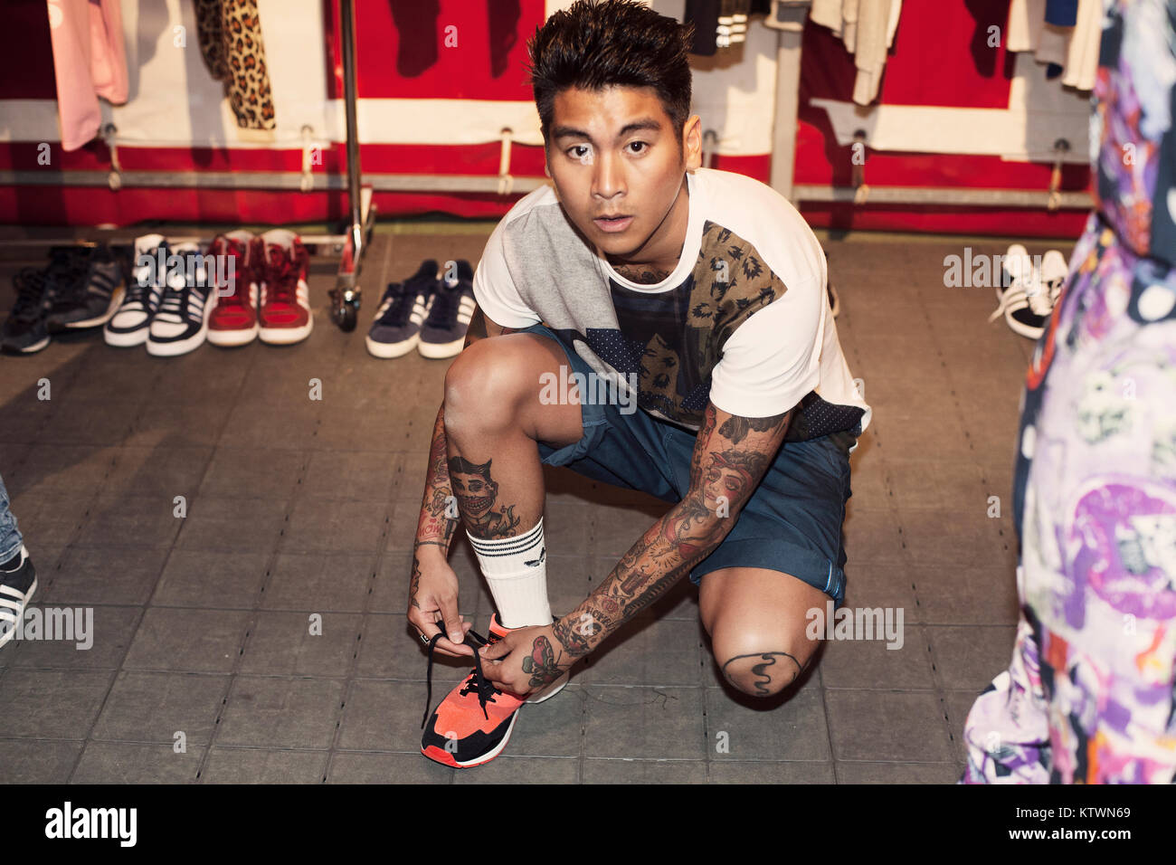 A Model is getting ready for the Adidas Orginals Show at Copenhagen ...