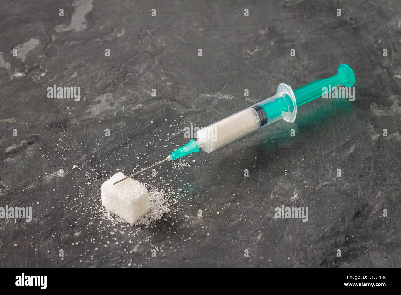 Sugar in a syringe. Conceptual depiction of dependence on the sweet ...