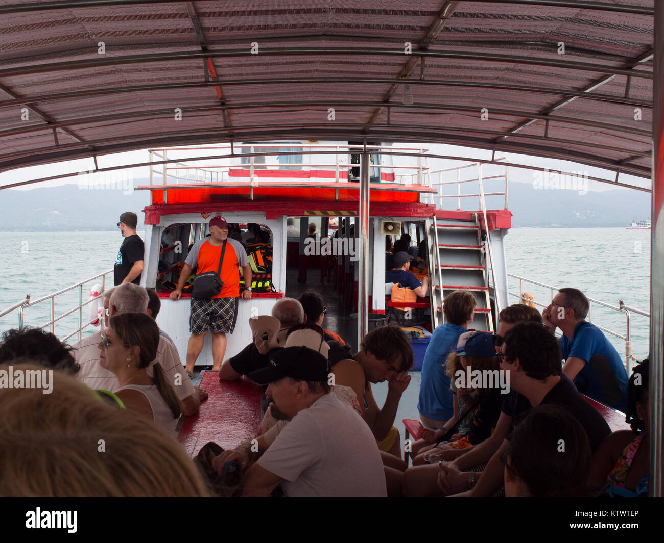 Tender Boat Passengers Stock Photo - Alamy