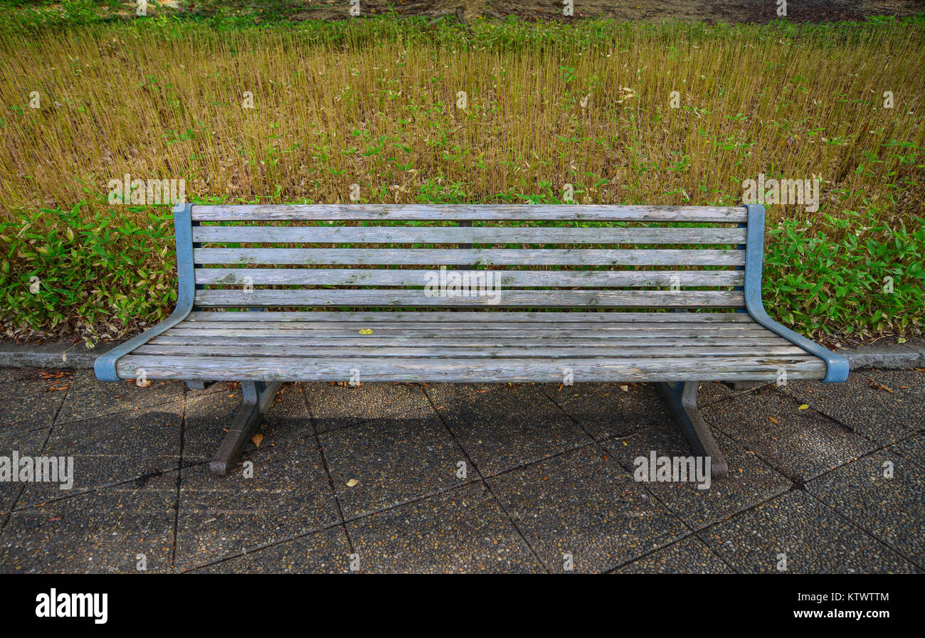 Wooden bench at the park in Okayama, Japan Stock Photo - Alamy