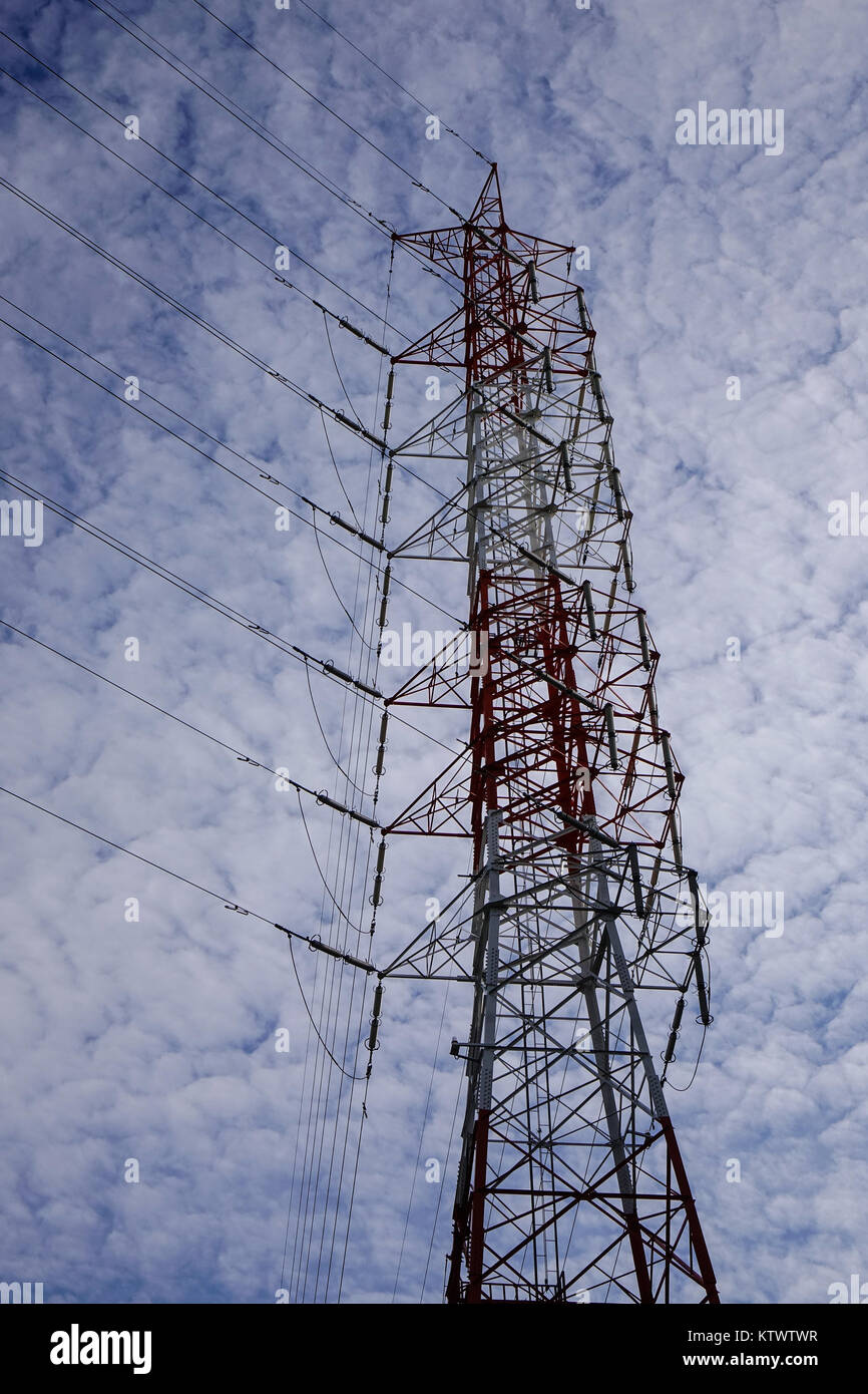 Wire electric pylon under blue sky at sunny day Stock Photo - Alamy