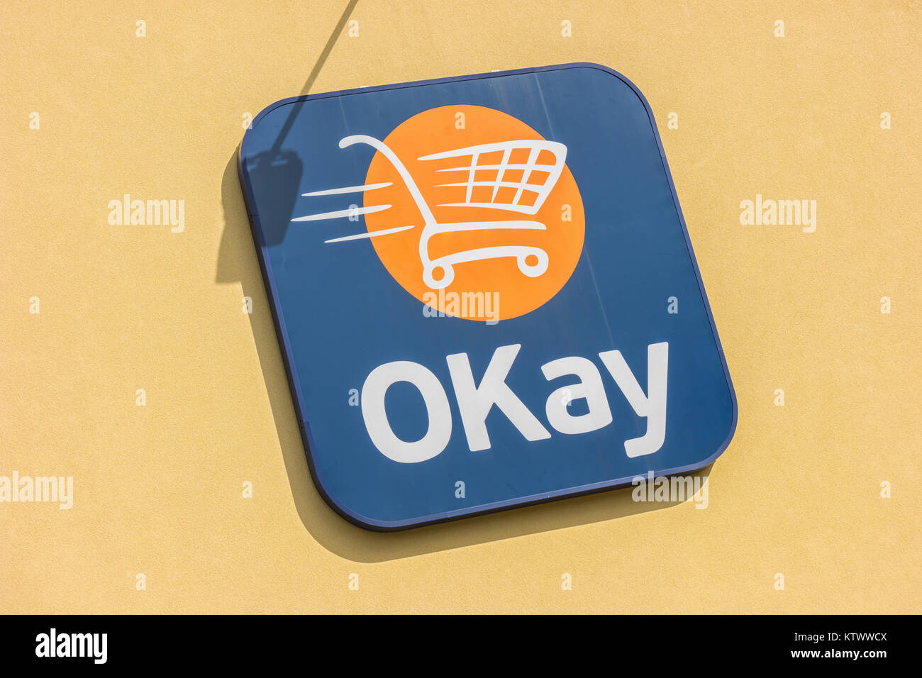 OKay supermarket logo on a Store. OKay is a neighbourhood stores ...