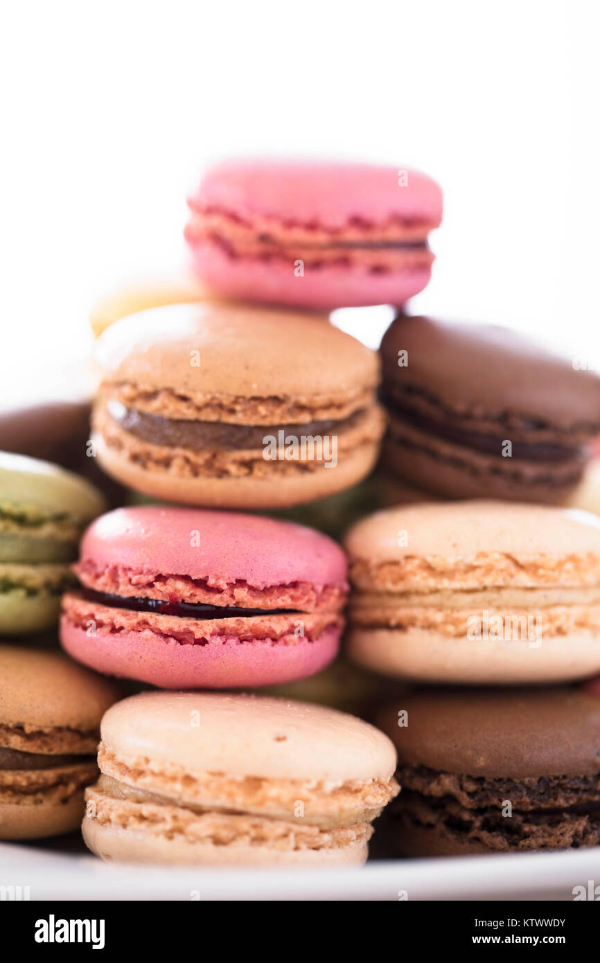 Stack of macaroons, chocolate, vanilla and strawberry Stock Photo - Alamy