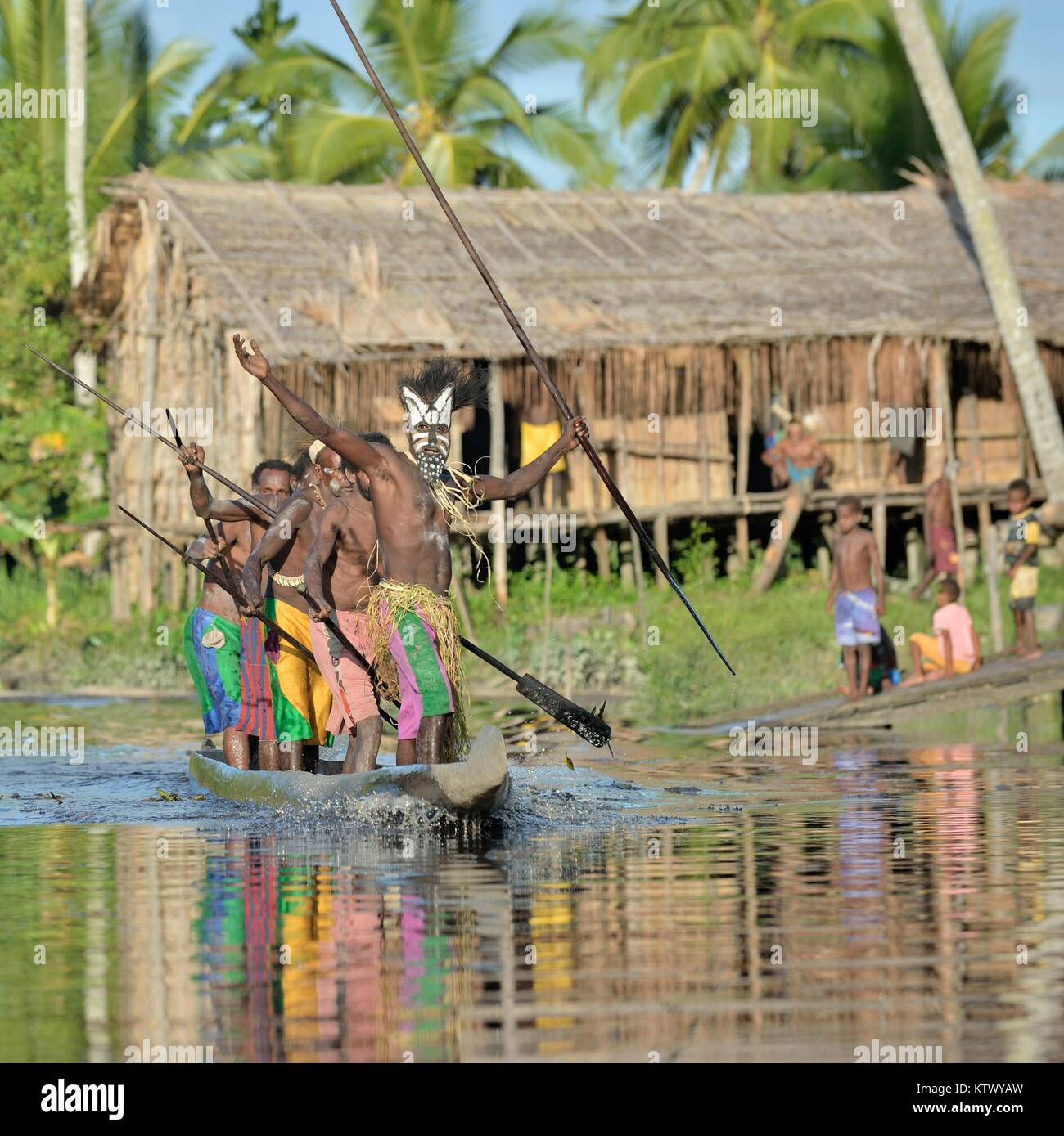 Canoe war ceremony of Asmat people. Headhunters of a tribe of Asmat ...