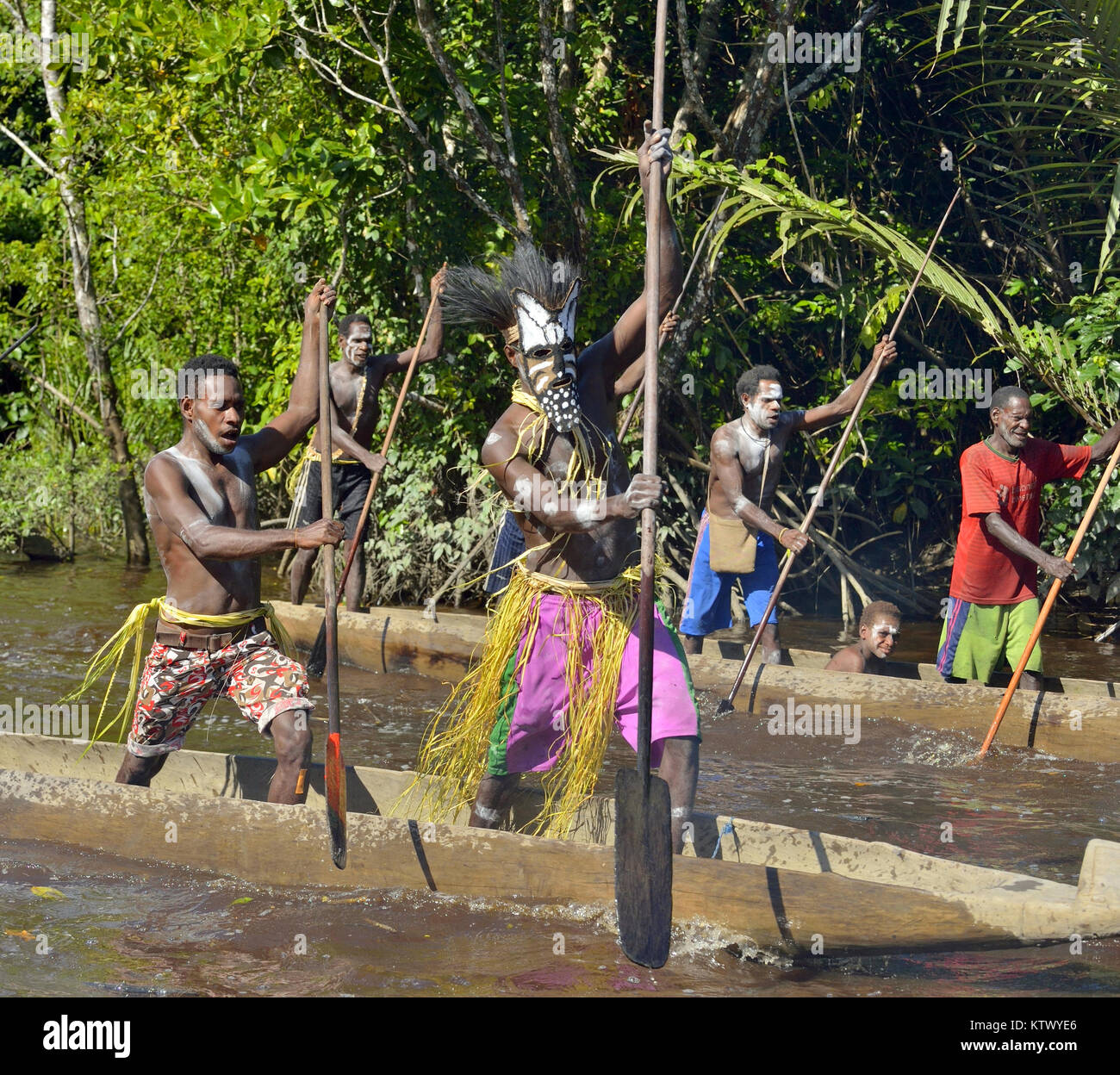 Canoe war ceremony of Asmat people. Headhunters of a tribe of Asmat ...