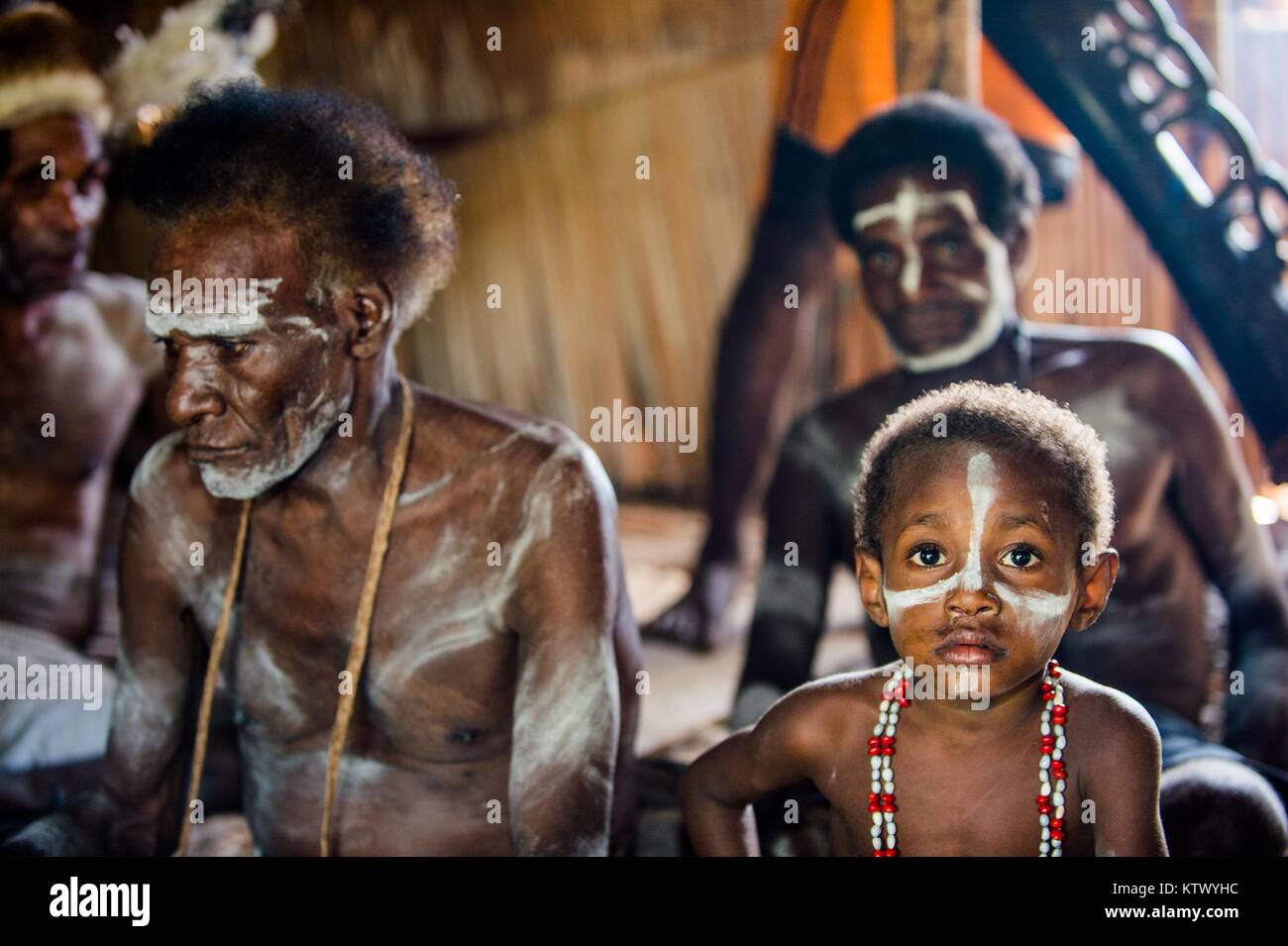 The Asmat Papua Welcoming ceremony. Boy from the tribe of Asmat people ...