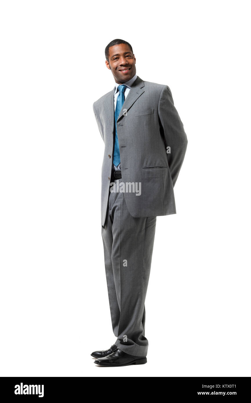 black businessman portrait standing up over white background Stock ...