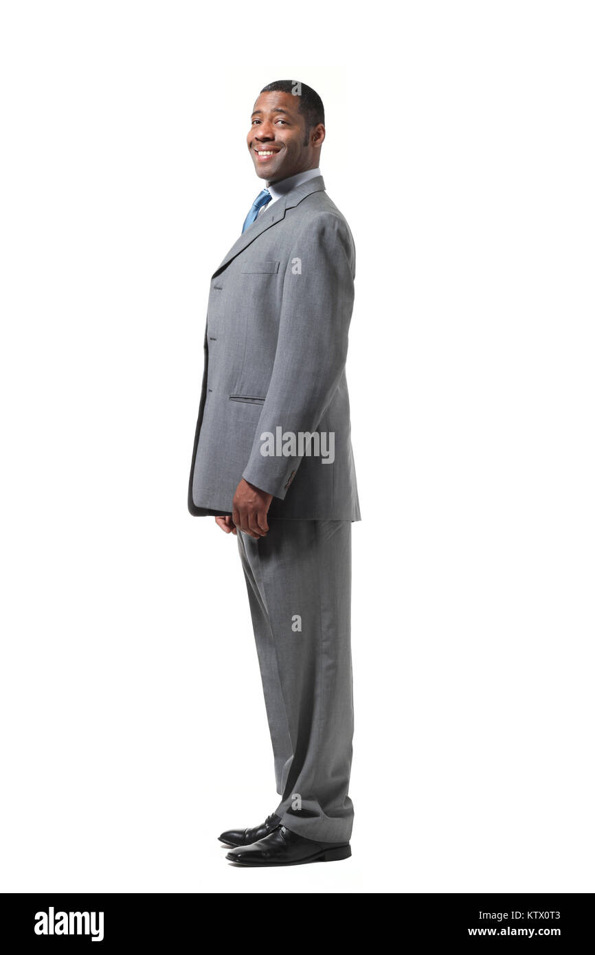 black businessman portrait standing up over white background Stock ...
