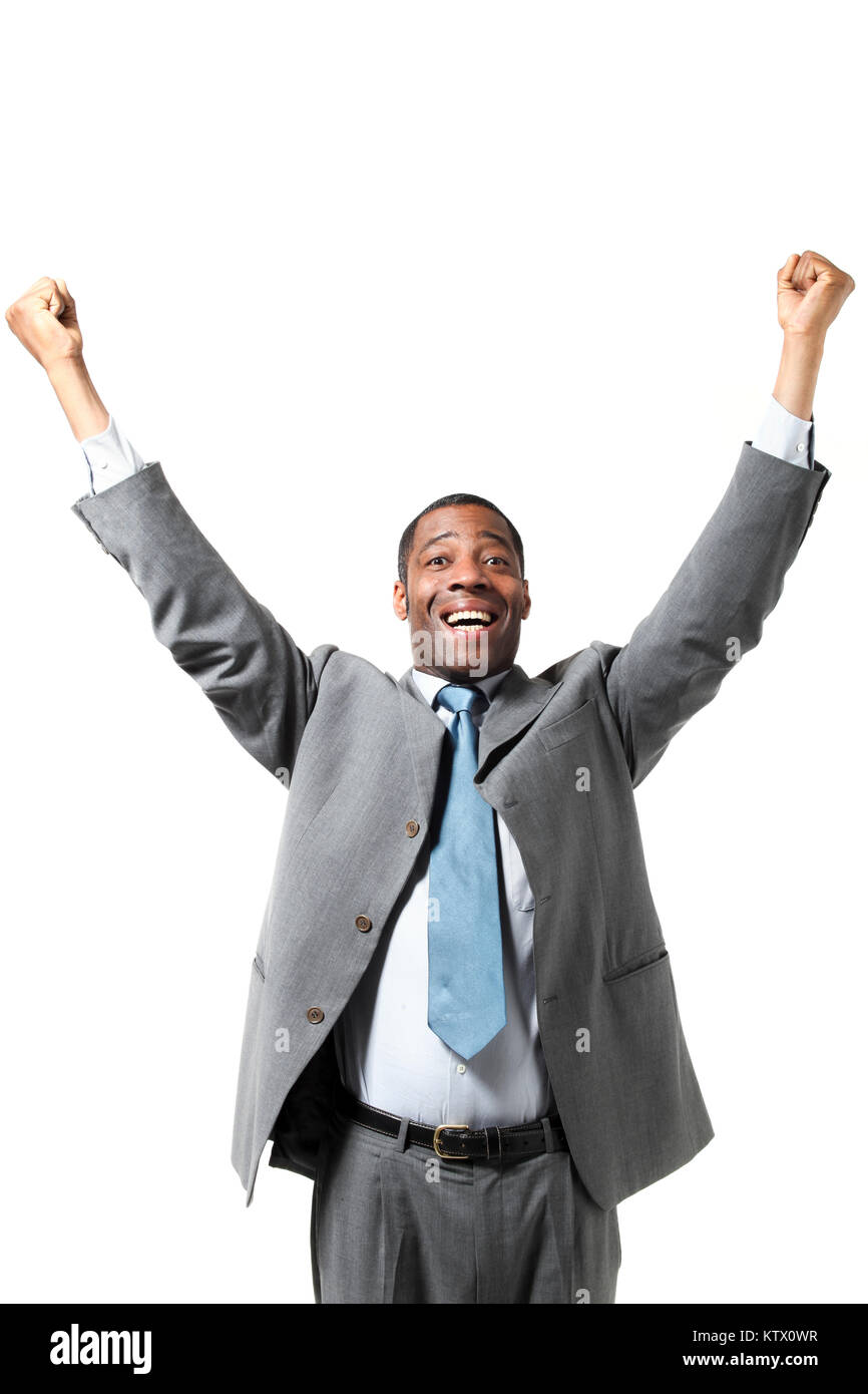 Exulting businessman over white background Stock Photo - Alamy