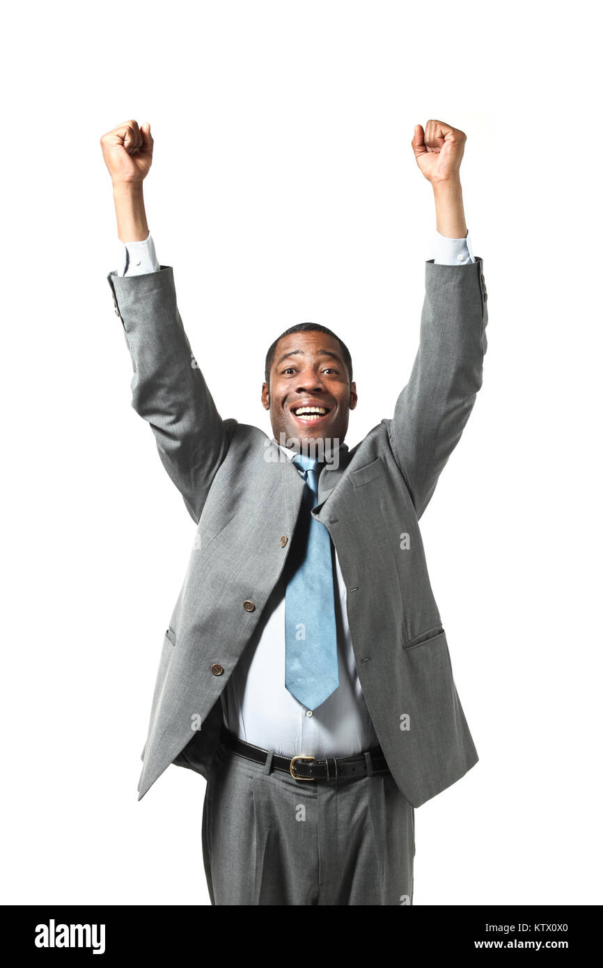 Exulting businessman over white background Stock Photo - Alamy