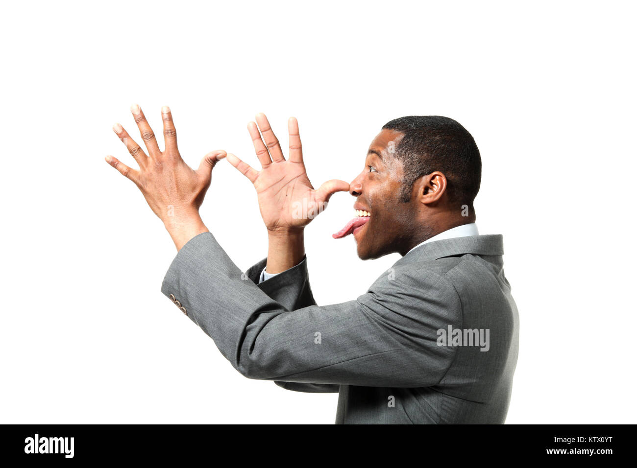 black man joking over white background Stock Photo - Alamy