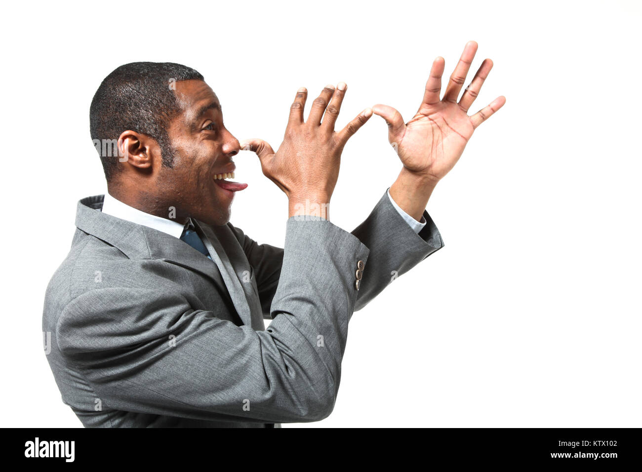 black man joking over white background Stock Photo - Alamy