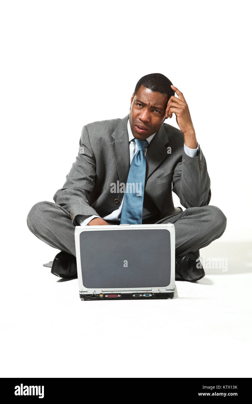 portrait of black businessman with laptop over white background Stock ...