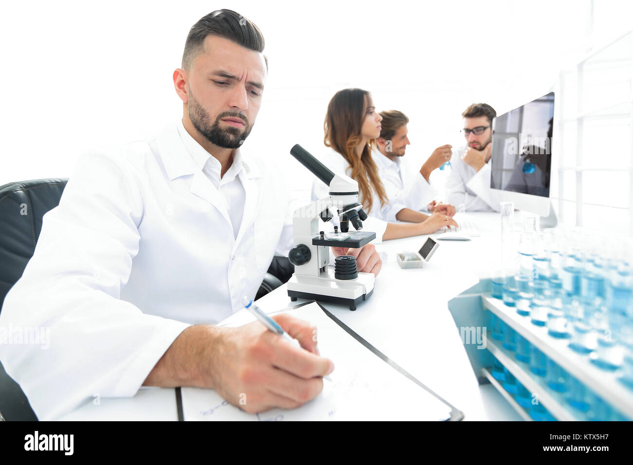 young scientist works in the lab Stock Photo - Alamy