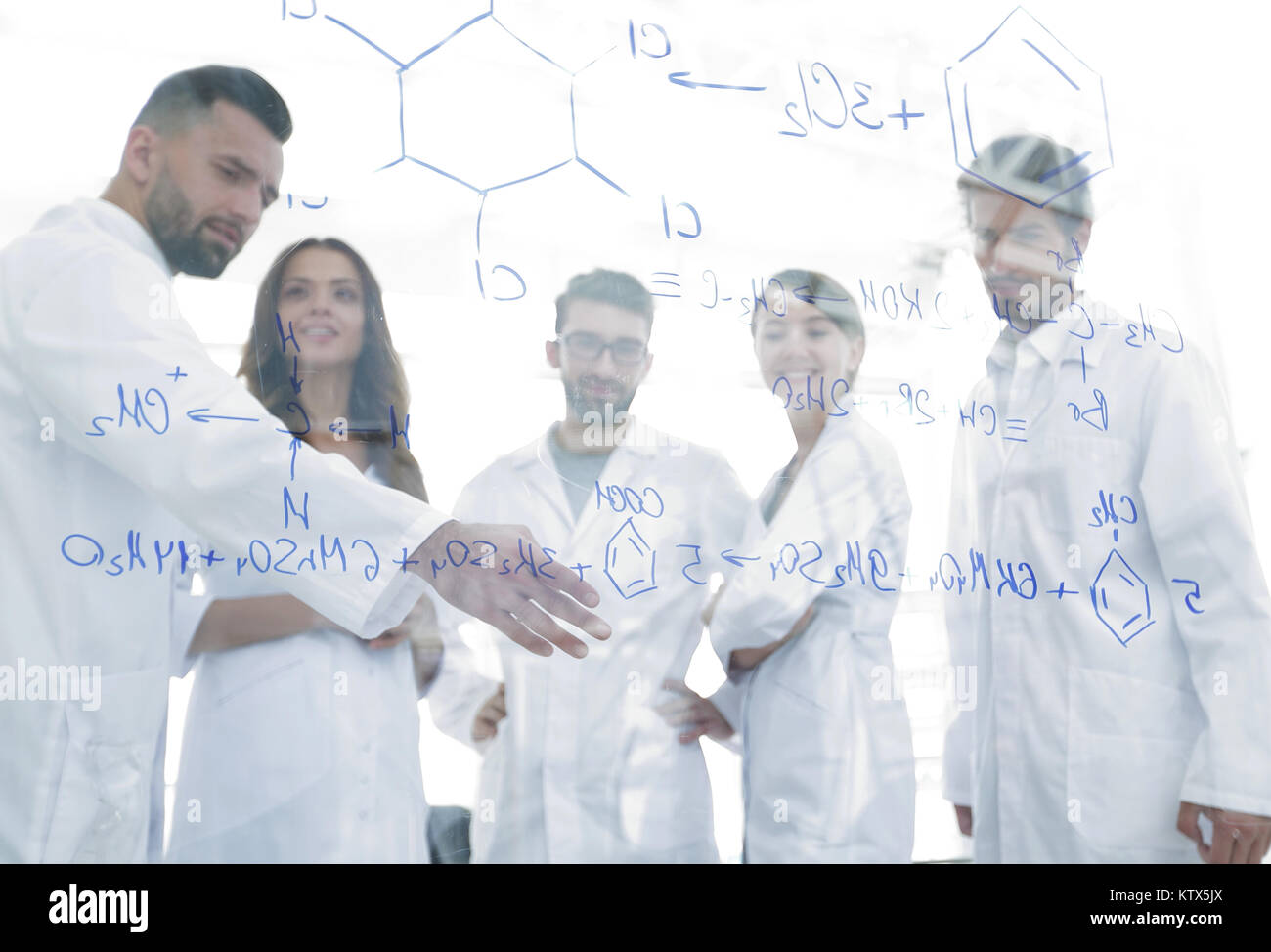 in the background image group laboratory scientists discussing their ...