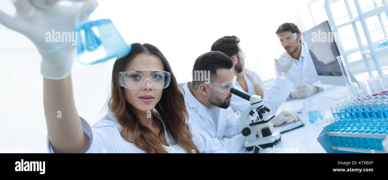 group of creative scientists working in a laboratory Stock Photo - Alamy