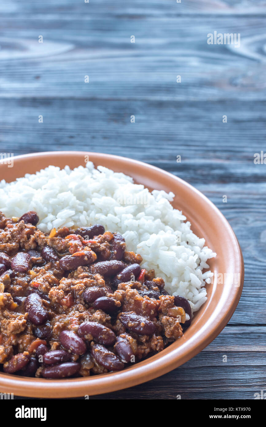 Bowl of chili con carne with white rice Stock Photo - Alamy