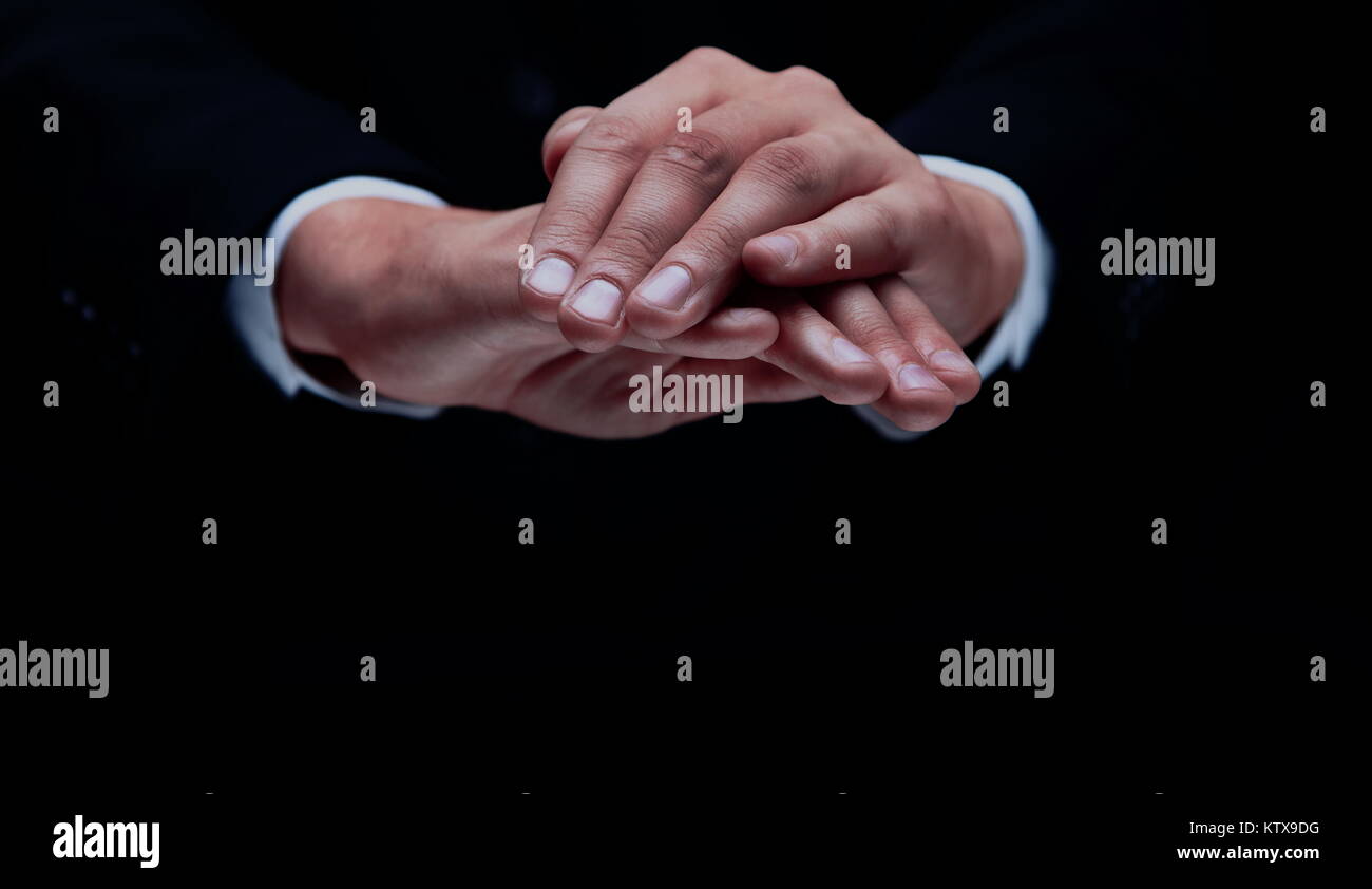 Human hands on black background Stock Photo - Alamy