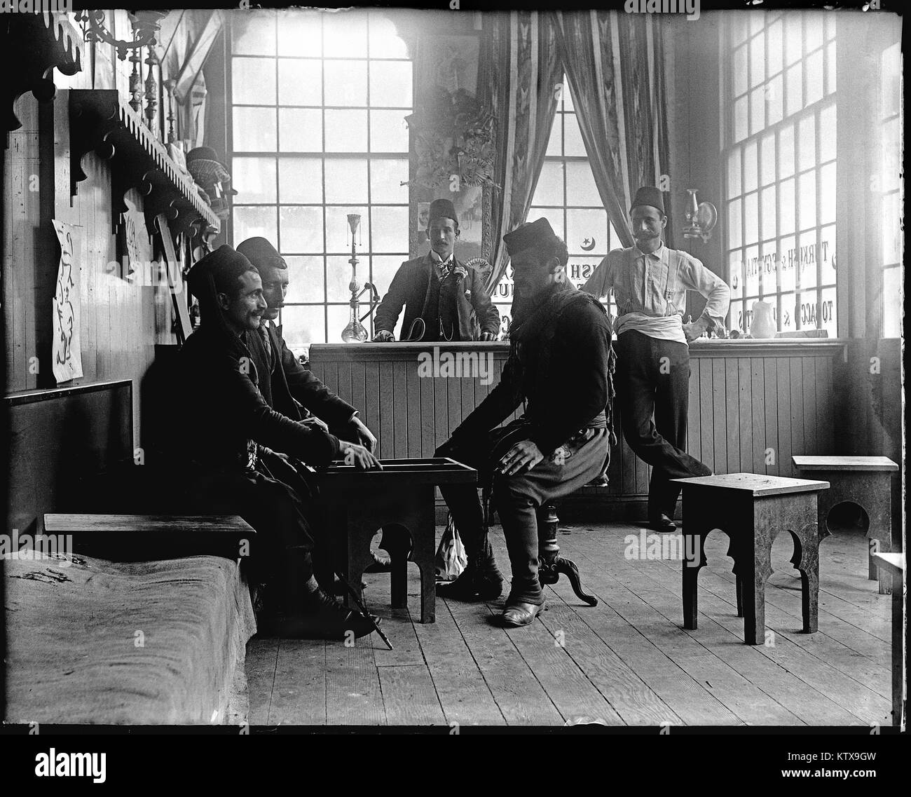 Playing board game at the California Midwinter International Exposition ...