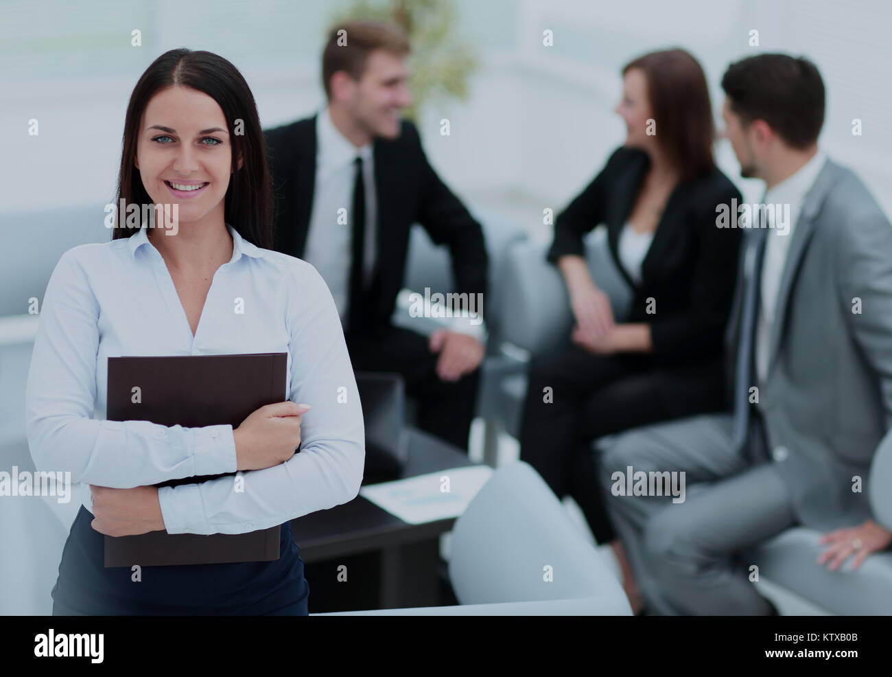 Business people working around table in modern office Stock Photo - Alamy