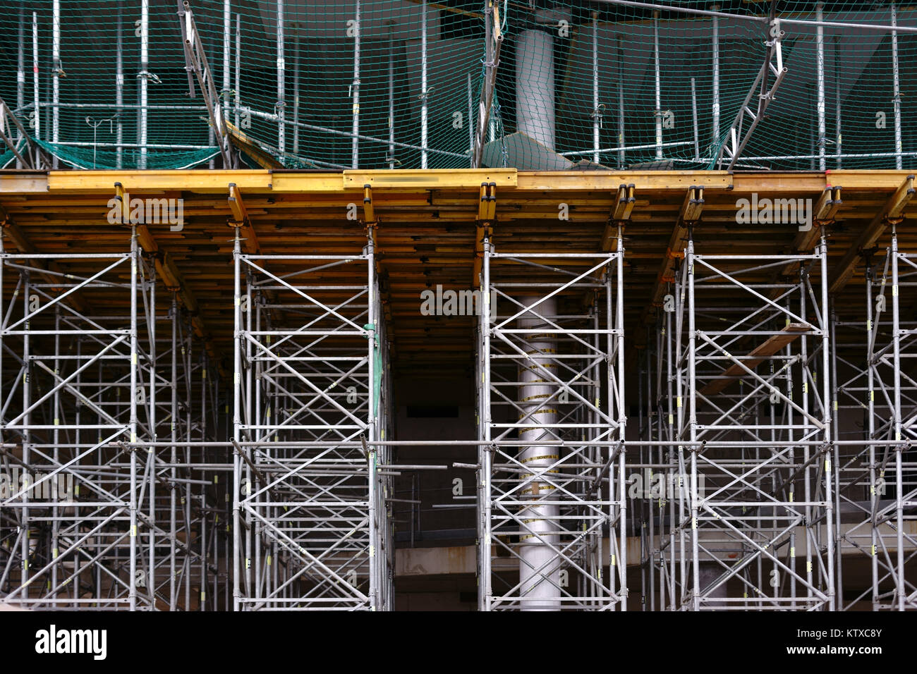 The close-up of a scaffolding with buttresses and safety nets Stock ...