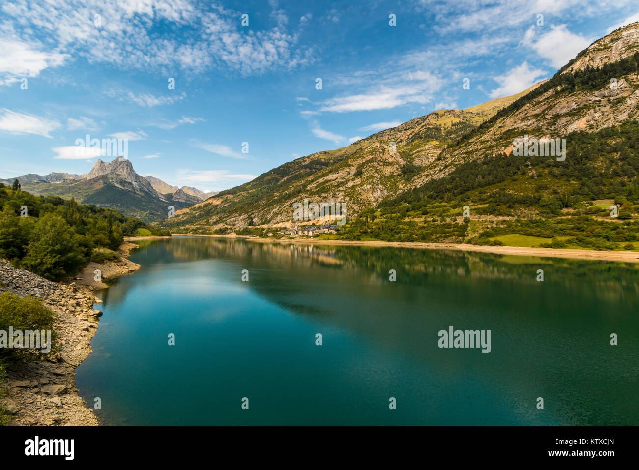 Lanuza lake and village and Pena Foratata peak in the scenic upper Tena ...
