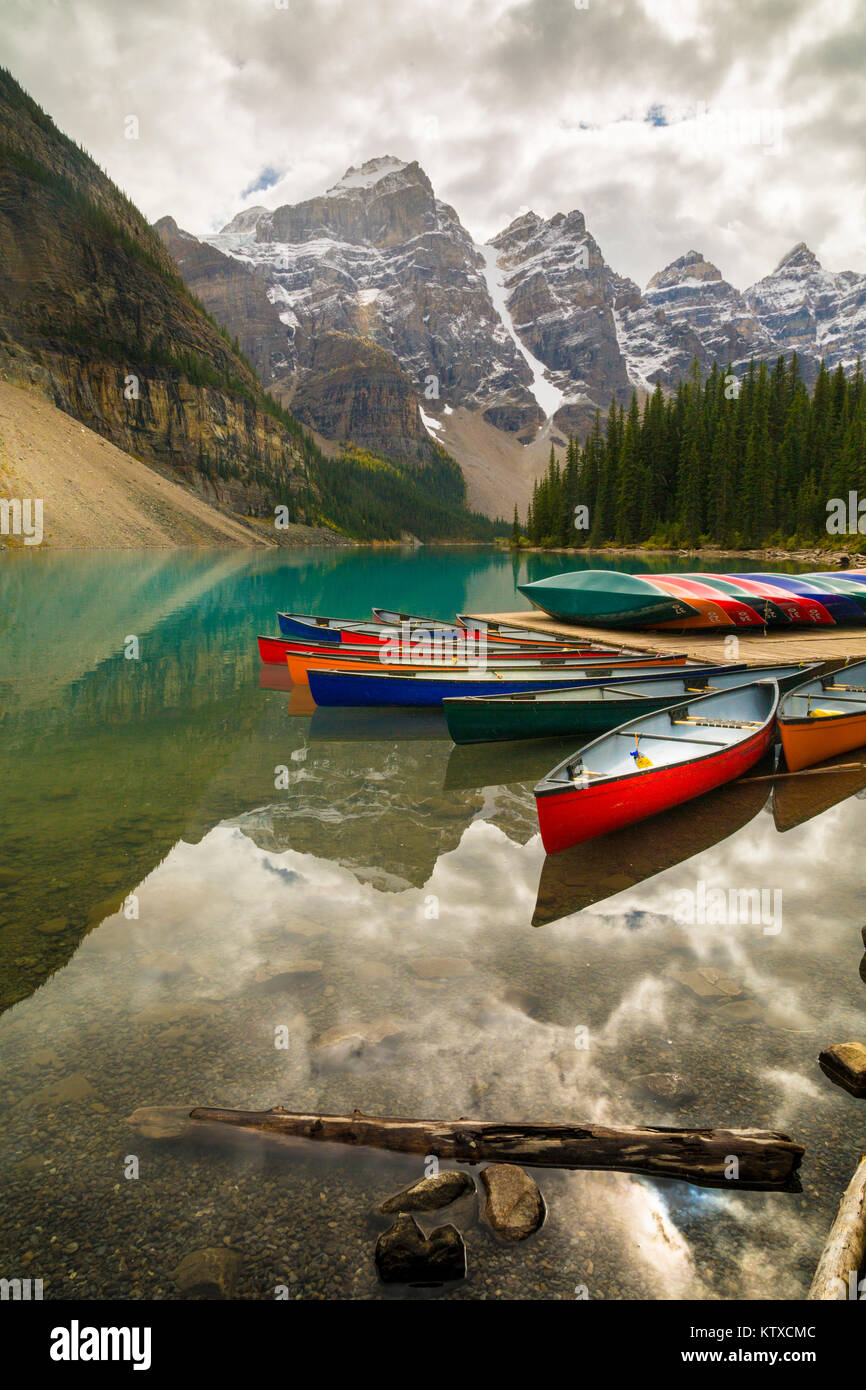 Tranquil setting of rowing boats on Moraine Lake, Banff National Park ...