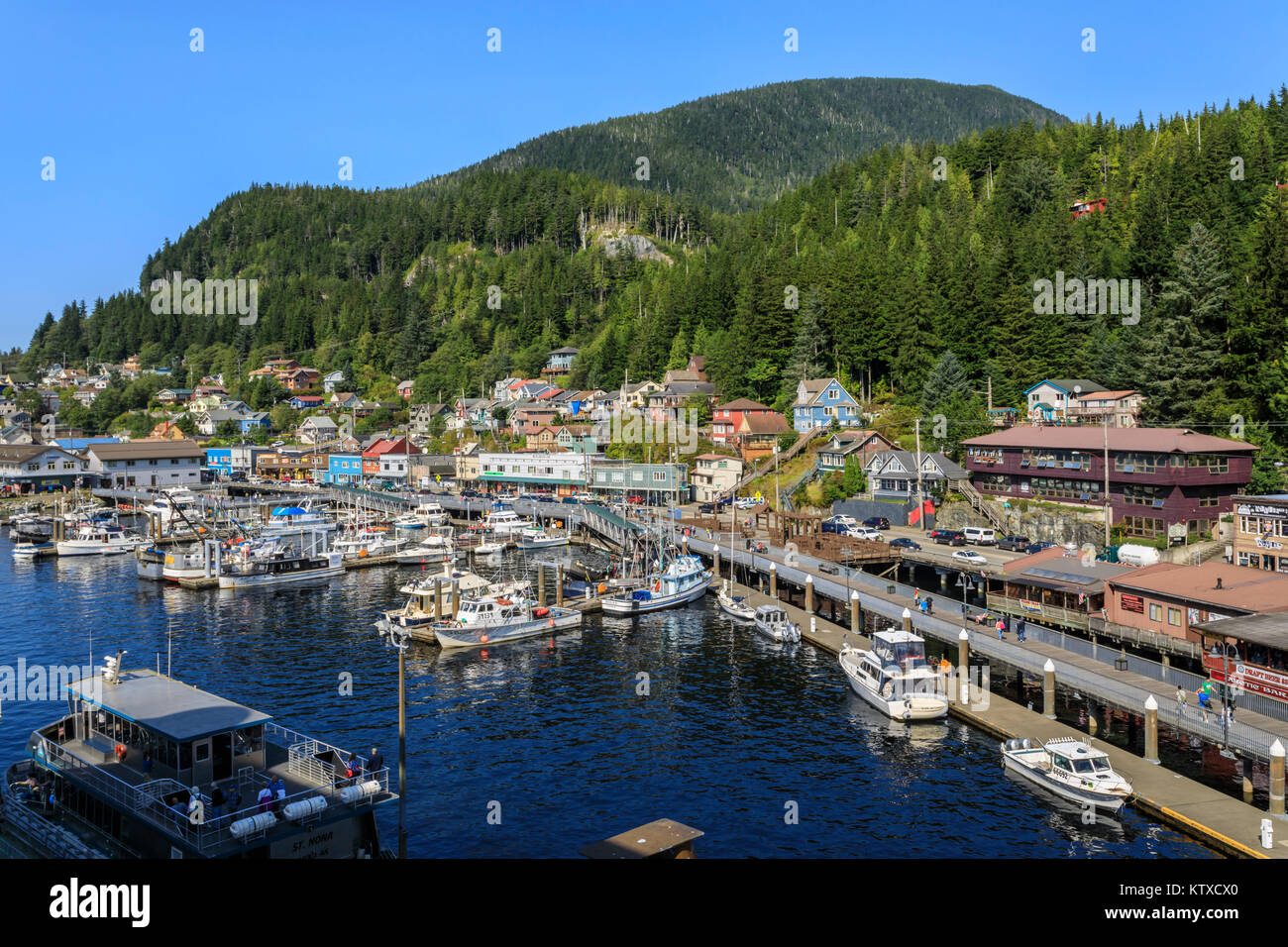 Small boats, town and forest, beautiful sunny summer day, Ketchikan ...