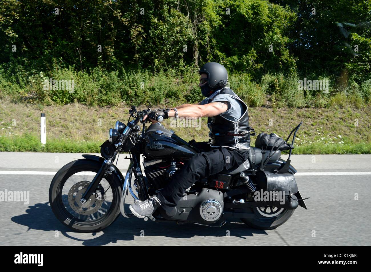 motorcyclist on the street Stock Photo - Alamy