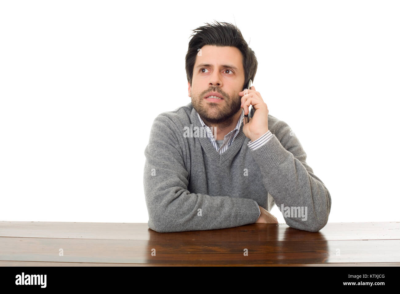 happy man on a desk on the phone, isolated Stock Photo - Alamy