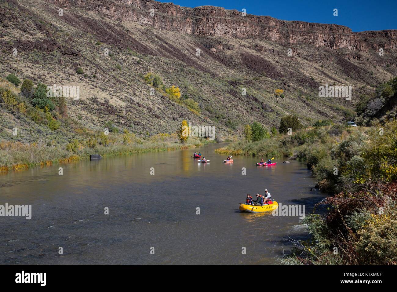 Tourists kayak and white water raft down the Rio Grande Wild and Scenic ...