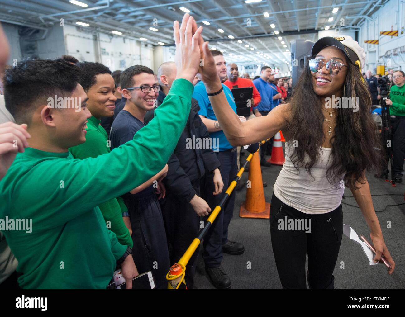 World Wrestling Entertainment (WWE) wrestler Alicia Fox high-fives U.S ...