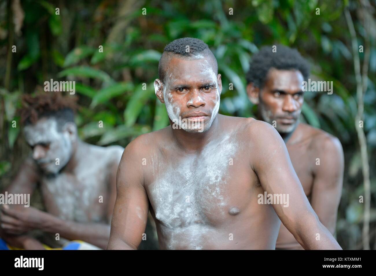Portrait of a man from the tribe of Asmat people. Asmat people village ...