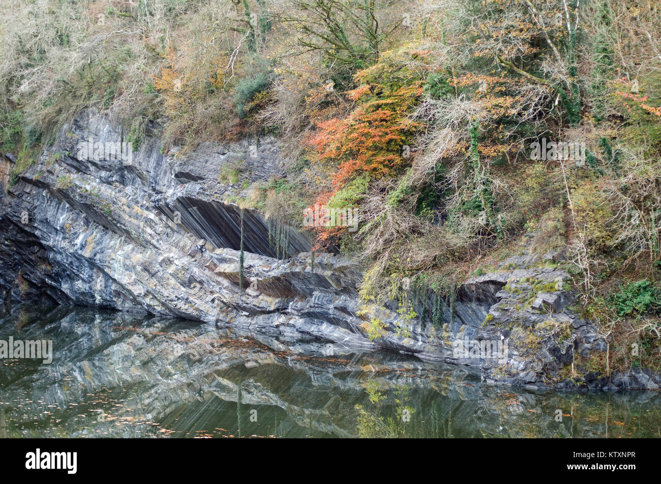 Meldon Quarry lake and remarkable shelf of rock Stock Photo - Alamy