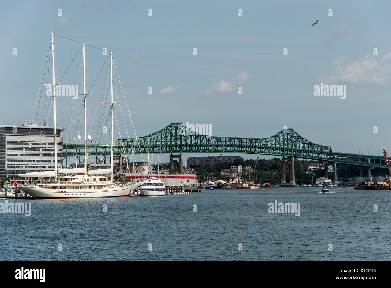 Tobin bridge in Boston, MA, USA and the Athena 295 foot yacht docked at ...