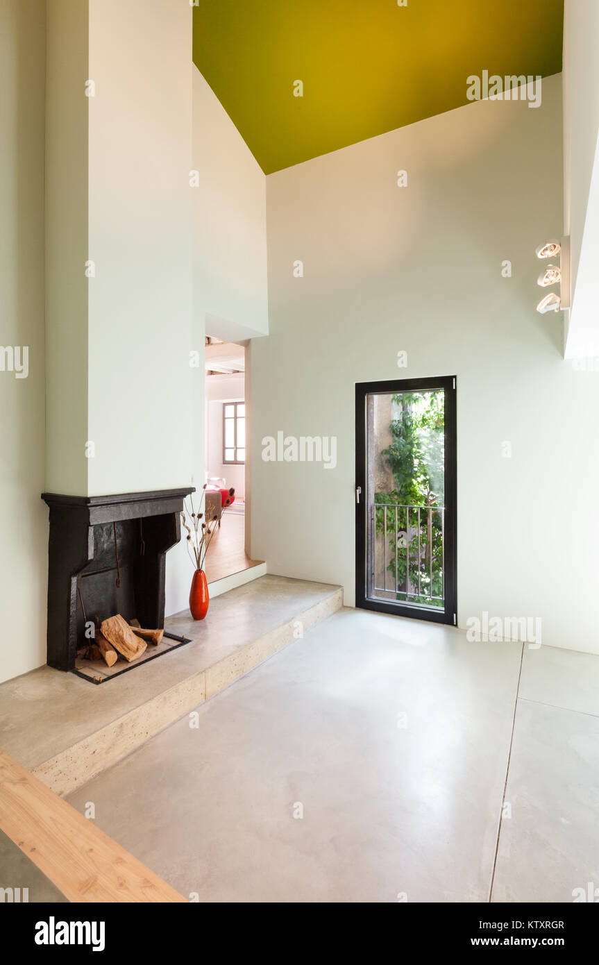 Beautiful modern house; view room with fireplace Stock Photo - Alamy